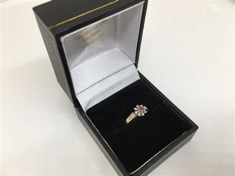 Preowned 9 Carat Yellow Gold Ruby And Diamond Cluster Ring Aylesbury