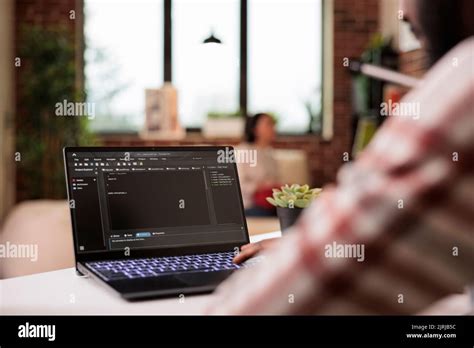Male It Engineer Programming App Code Developing Online Software With Cloud Server And Firewall