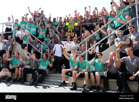 Race Winner Nico Rosberg GER Mercedes AMG F Celebrates With Team Mate Lewis Hamilton GBR