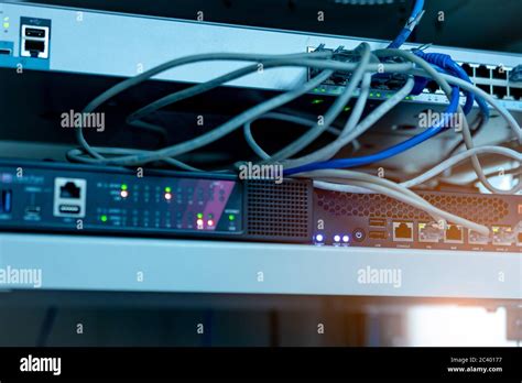 Ethernet Cables And Network Switch In Data Center Wifi Plug Of Internet Router For Computer