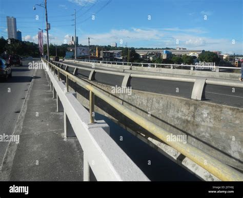 The Marcos Bridge Spanning The Marikina River Connects The Barangays
