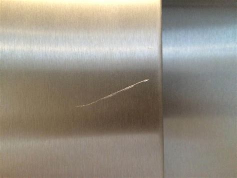 Stainless Steel Lift Door Scratch Removal Bespoke Repairs