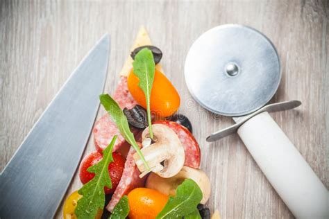 Creative Composition Of Ingredients Tomatoes Cheese Salami Mushrooms