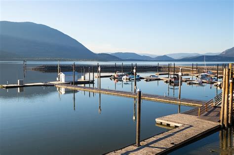 Premium Photo Shuswap Lake Salmon Arm Wharf Canada At Sunset With Boats