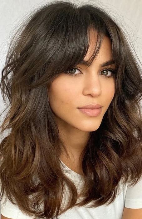 Long Layered Haircuts With Side Fringe