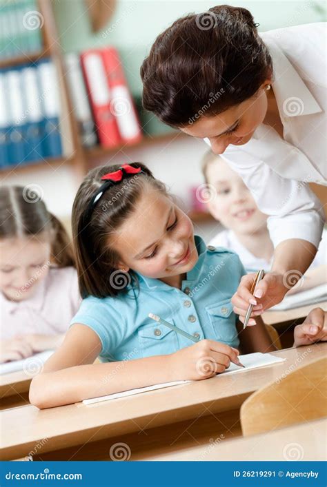 Teacher Helps Pupils To Do The Task Stock Image Image Of Beautiful Hair