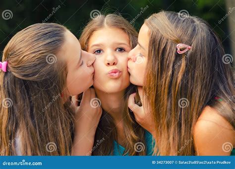 Teenage Girl Kissed On The Cheeks Stock Image Image Of Lady Holding