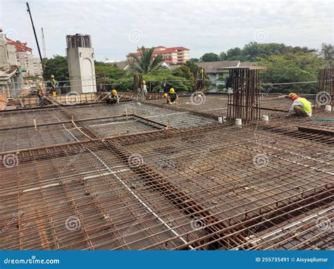 Construction Workers Are Fabricating Steel Reinforcement Bars For Floor