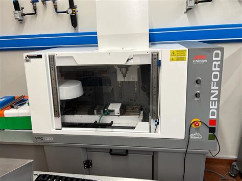 Cnc Mill With Integrated Machine Base And Flood Coolant — Khalifa University