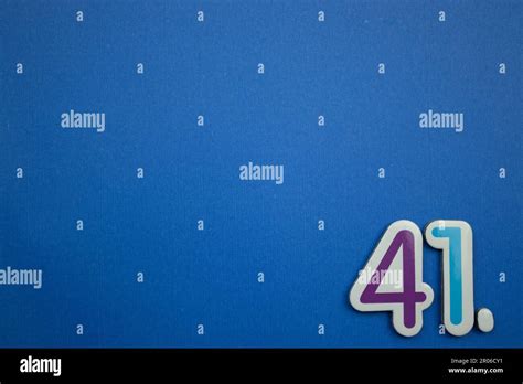 The Number 41 Photographed From Above Purple And Light Blue Placed