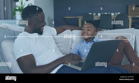 Image Of Increasing Percentage Over African American Father And Son