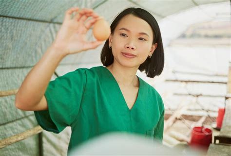 Premium Photo | Veterinary egg and medical with woman on farm for ...