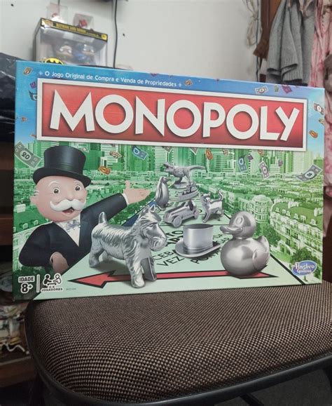 Jogo De Tabuleiro Monopoly O Jogo De Compra E Venda De Propriedades Hasbro Jogo De Tabuleiro