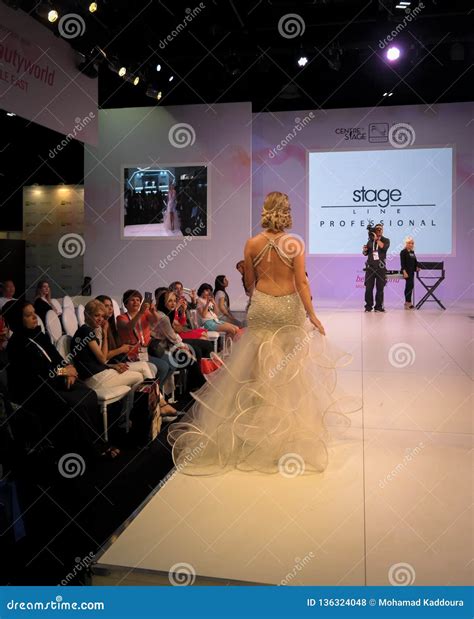 Beautiful Model Posing Catwalk On Stage Showing Wedding And Bridal