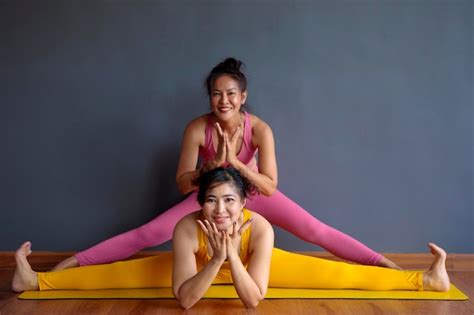 Premium Photo Portrait Of Women Doing Splits