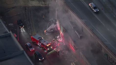 Firefighters Put Out Garbage Fire Next To 10 Freeway In Downtown Los