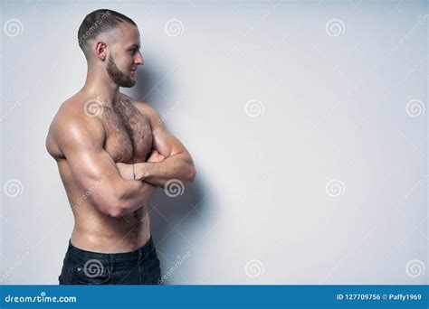 Profile Muscular Man Shirtless Standing With Folded Hands Looking