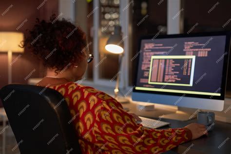 Premium Photo | Female programmer working till late night