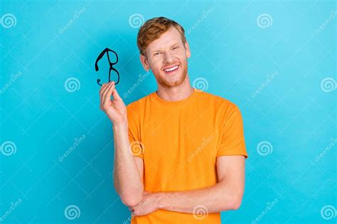 Photo Of Red Hair Guy Wear Orange T Shirt Eyewear Isolated On Blue