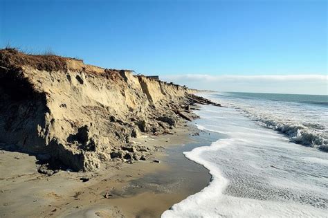 Assessing The Vulnerability Of Coastal Infrastruct Generative Ai Premium Ai Generated Image