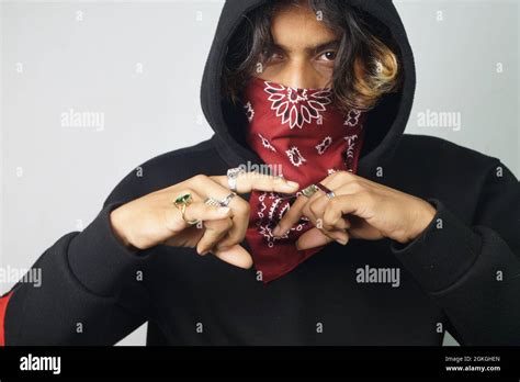Young Thug Indian Male With A Bandana Covering His Face Doing Gang