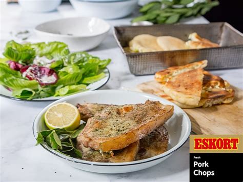 Braaied Bay Leaf And Sage Pork Chops With Chargrilled Four Cheese Pitas