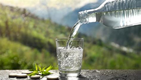 Premium Photo Water Being Poured Into A Glass Generative Ai