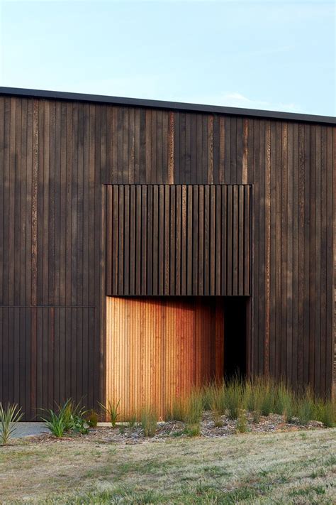 Weathered Timber Clads A Holiday Home In New Zealand