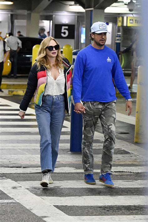 Heather Graham And John De Neufville Arrives At Miami International