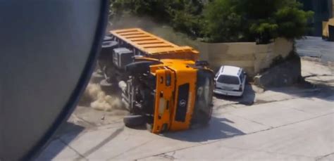 Crashing In Reverse Dump Truck Tips Over In Russia Autoevolution