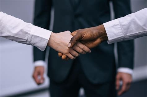 Premium Photo Handshake Of Business Partners After A Favorable Trade Deal