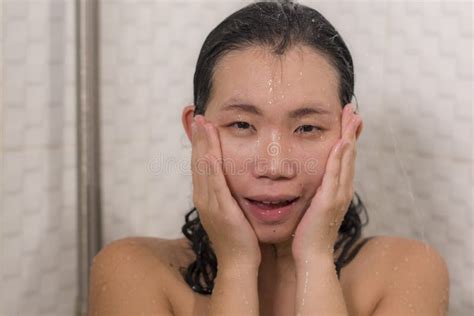 Young Beautiful And Happy Asian Chinese Woman Taking A Shower In The Bathroom Washing Her Hair