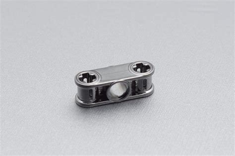 Technic Axle And Pin Connector Perpendicular 3L With Center Pin Hole