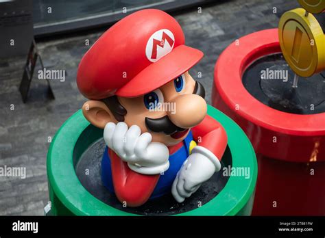 Top Down View Of The Popular Game Character Super Mario In The Green