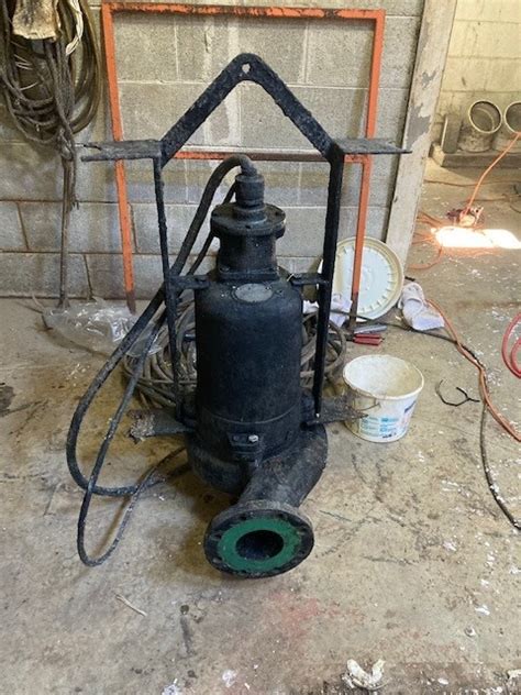 Whitman County Severe Clogging Problems Solved With ABS Pump On Custom Slide Bracket Reiner