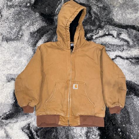 Tan Carhartt Jacket Has A Small Hole On Front And Depop