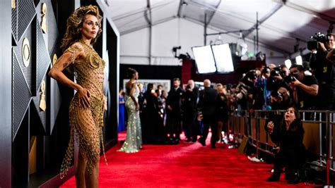Miley Cyrus Wears A Naked Dress Made Of Gold Safety Pins At The 2024