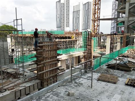 Construction Workers Work At Height And Wear Safety Gear To Ensure Their Safety Editorial