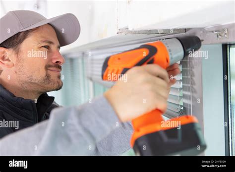Installing Window Blinds Hi Res Stock Photography And Images Alamy