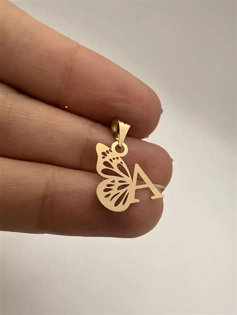 پلاک حروف و بال پروانه گالری طلای مرجان
