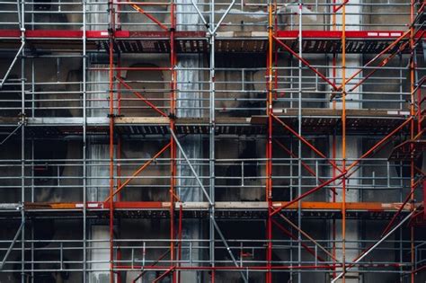 Closeup Photo Of Scaffolding Around A Halfbuilt Structure Displaying
