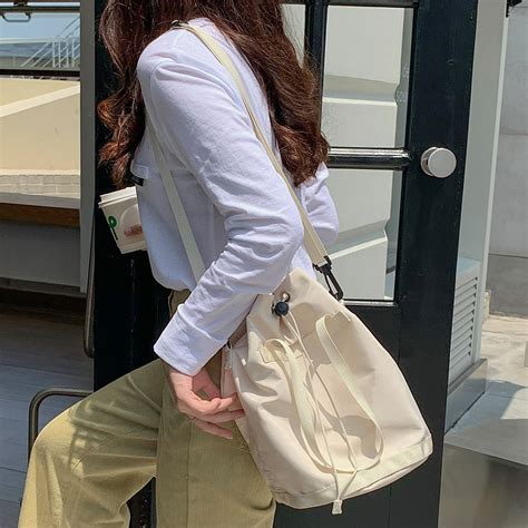 윤키 [윤키] 보부상 대학생 커플 복조리 버킷백 크로스가방 나일론백