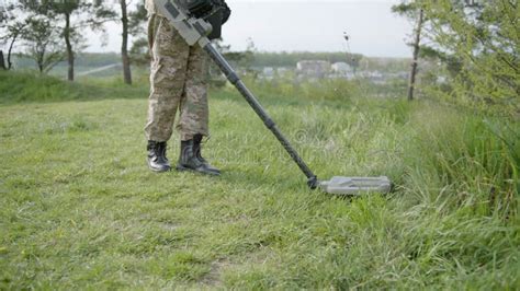 Military Sapper With A Metal Detector In The Field Stock Video Video