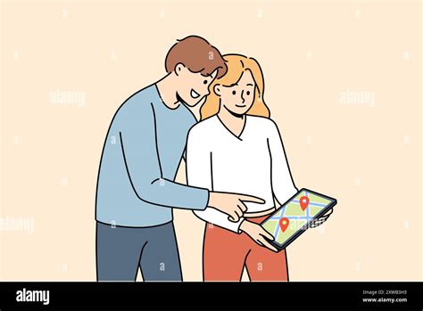 Digital Maps Are Used By Man And Woman To Plot Route While Traveling To