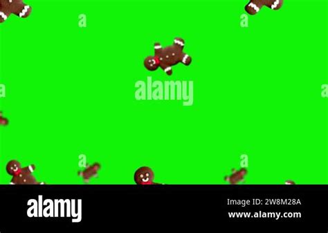 Flying Gingerbread Man Christmas Gingerbread Of Different Diameters On The Green Screen On