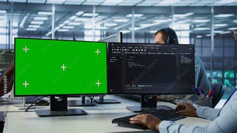 IT Specialist In Server Farm Using Green Screen PC Ensuring Valuable
