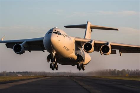 Premium Photo Cargo Aircraft Il76 Russian Emercom Is Landing