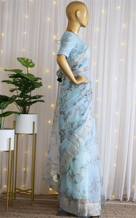 Sky Blue Floral Gota Work Organza Saree With Mirrorwork Blouse