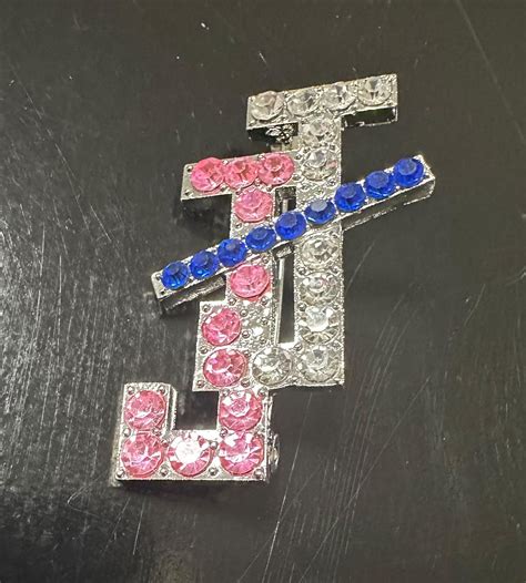 Interlocking JJ Lapel Pin Les Soeurs Legacy