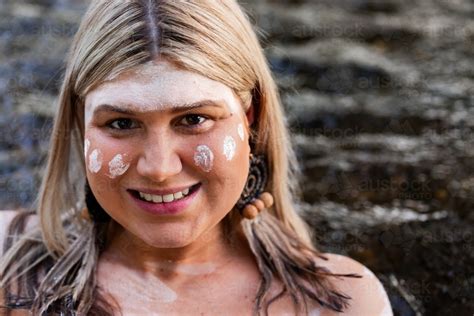 Image Of Close Up Portrait Of Aboriginal Woman Smiling With Woven
